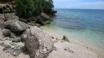 Na praia, snorkel