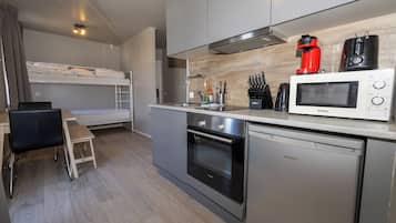 Apartamento Comfort, 1 quarto | Sala de estar | TV de ecrã plano, Netflix