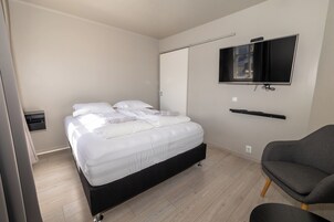 Apartamento Comfort, 1 quarto | Cortinas/cortinados opacos, Wi-fi grátis, roupa de cama fornecida