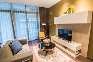 Apartamento, 1 quarto | Sala de estar | TV LCD