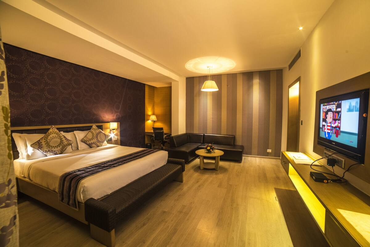 Quarto premium, vista para a cidade | Roupas de cama premium, frigobar, cofres nos quartos, escrivaninha