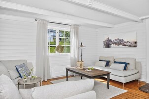 Apartamento, 3 quartos | Área de estar