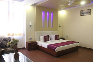 Suite Familiar, 1 cama king-size, Vista para a cidade, no piso executivo | Camas desdobráveis, Wi-fi grátis 