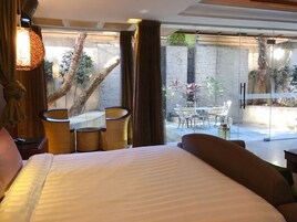 Quarto Duplo Deluxe, varanda | Vista para o jardim