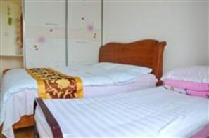 Apartamento, 2 quartos | 1 quarto, escrivaninha, cortinas blackout, Wi-Fi de cortesia