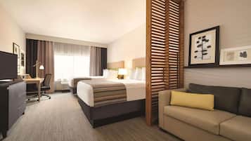 Suite, 1 quarto, não fumadores | 1 quarto, cofre no quarto, ferro/tábua de engomar, Wi-fi grátis