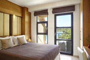 Vila superior, 4 quartos, piscina particular, vista para a praia | 1 quarto, roupas de cama premium, cofres nos quartos