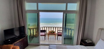 Quarto Deluxe, 1 cama king-size, vista para o mar | Ferro/tábua de engomar, Wi-fi grátis, roupa de cama fornecida 
