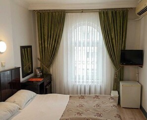 Quarto Individual | Roupa de alta qualidade, quartos insonorizados, Wi-fi grátis 