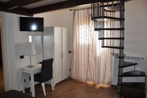 Quarto Quádruplo Comfort, vista para o pátio | Vista do quarto