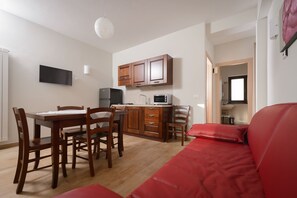 Quarto Familiar | Sala de estar | TV de ecrã plano 