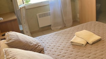 Quarto casal | Roupas de cama premium, quartos à prova de som, Wi-Fi de cortesia