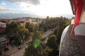 Quarto Triplo Comfort, vista para o jardim | Vista do quarto