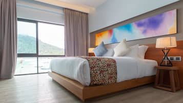Suíte premier, acessível, vista para o mar | Frigobar, cofres nos quartos, escrivaninha, quartos à prova de som