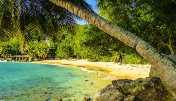 Na praia, toalhas de praia 