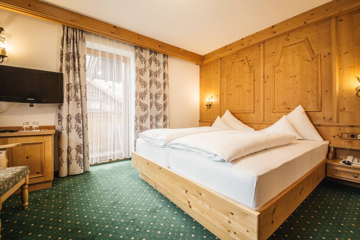 Quarto Individual | Minibar, cofre no quarto, secretária, Wi-fi grátis
