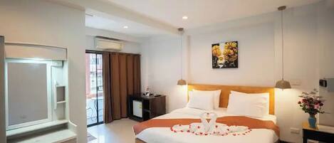 Quarto Duplo Superior | Minibar, cofre no quarto, cortinas/cortinados opacos