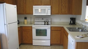 Apartamento, vários quartos | Cozinha privada