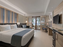 Quarto grand, vista para a praia | Frigobar, cofres nos quartos, escrivaninha