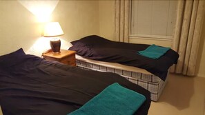 Apartamento, 2 quartos | 1 quarto, ferro/tábua de engomar, berços/camas para crianças grátis 