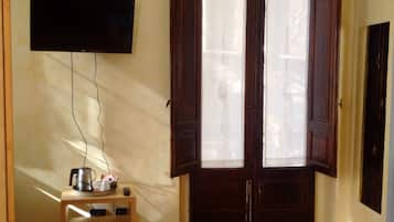 Quarto Duplo, varanda, Vista para a cidade | Comodidade do quarto