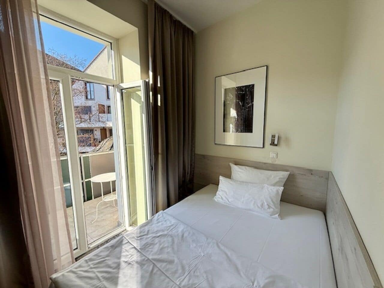 Quarto solteiro, sacada | Escrivaninha, Wi-Fi de cortesia, roupa de cama