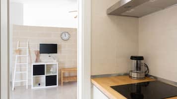 Suite, varanda | Wi-fi grátis, roupa de cama fornecida