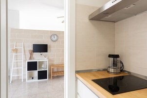 Suite, varanda | Wi-fi grátis, roupa de cama fornecida