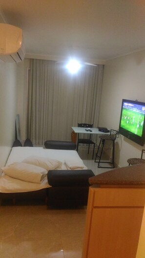 Apartamento 1301 | Sala | TV de ecrã plano 