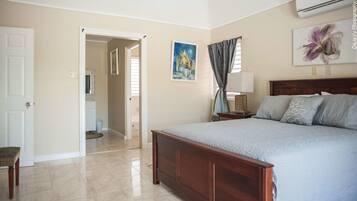 Villa Familiar, 4 quartos, acessível, vista para o oceano | 1 quarto, ferro/tábua de engomar, Wi-fi grátis, roupa de cama fornecida