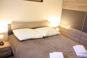 Apartamento | Ferro/tábua de engomar, berços/camas para crianças, Wi-fi grátis