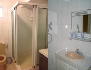 Casa Standard, 3 quartos | Casa de banho | Um polibã, toalhas fornecidas