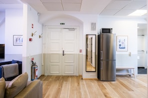 Apartamento grand, 4 quartos | Área de estar | TV de tela plana, Netflix, filmes pagos