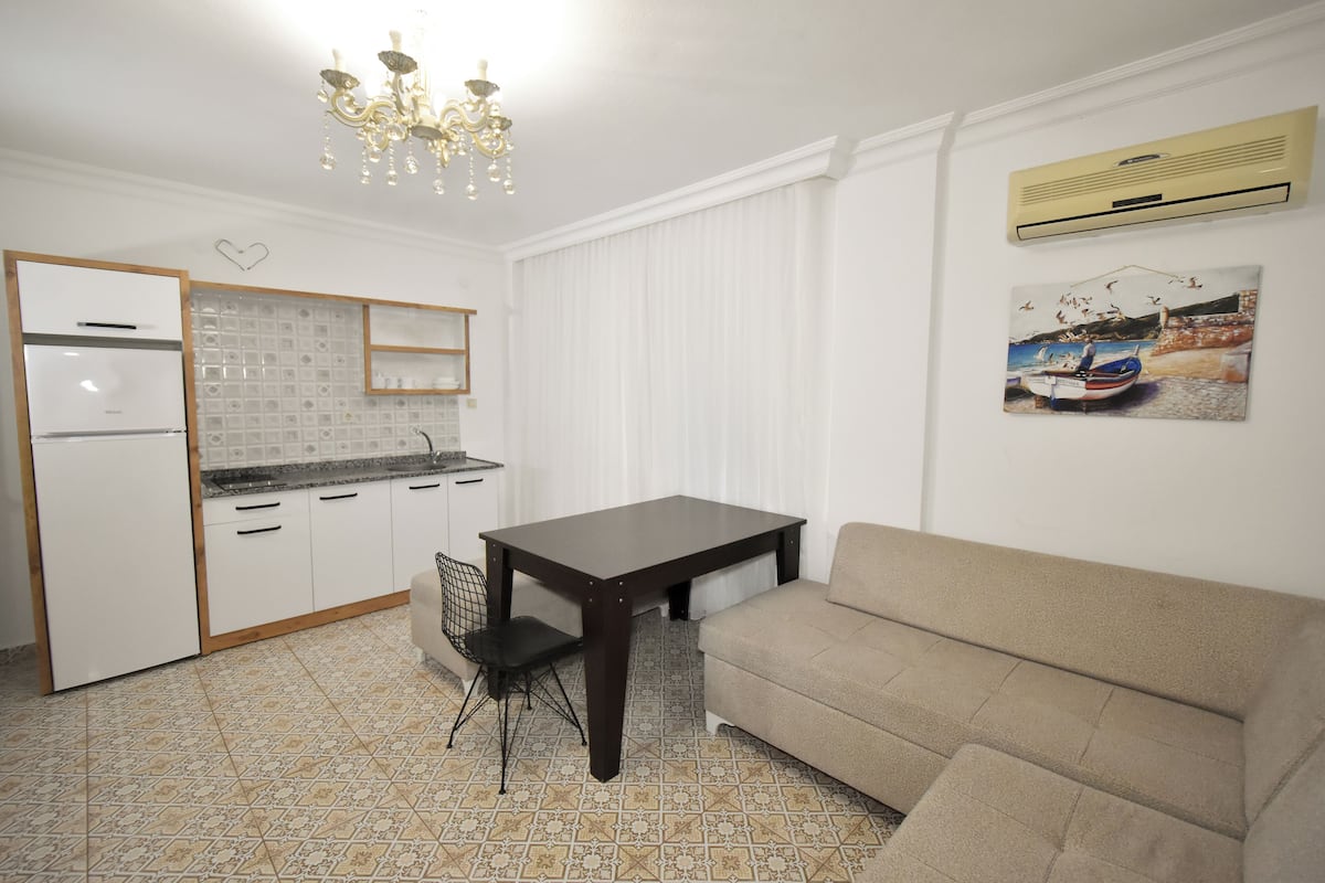 Suite Familiar, 1 quarto, cozinha, Vista para a cidade | Roupa de alta qualidade, cofre no quarto, secretária