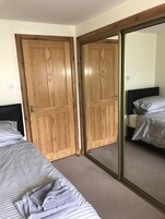 Apartamento Deluxe, 2 quartos | 2 quartos, cortinas/cortinados opacos, quartos insonorizados 