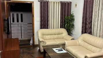 Apartamento, 1 quarto, cozinha | Área de estar | TV, filmes pagos