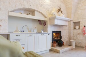 Apartamento standard | Cozinha privada | Geladeira, cooktop, chaleira elétrica