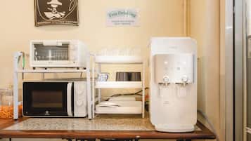 Um micro-ondas no espaço comum