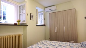 Apartamento Comfort, 2 quartos, Vista para a cidade | 1 quarto, secretária, ferro/tábua de engomar 