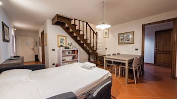 Apartamento Comfort, 2 quartos | Sala de estar | Smart TV