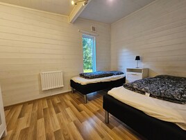 Apartamento Empresarial, 2 quartos, casa de banho privativa | Cortinas/cortinados opacos, ferro/tábua de engomar, Wi-fi grátis 