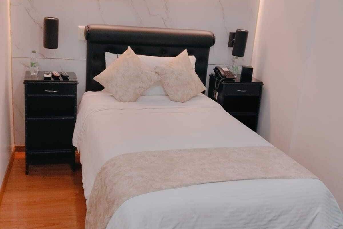 Quarto solteiro executivo | 1 quarto, frigobar, cofres nos quartos, individualmente decorados