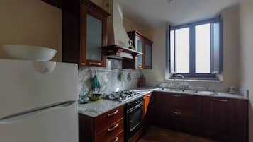 Apartamento Deluxe, 1 quarto | Cozinha privada