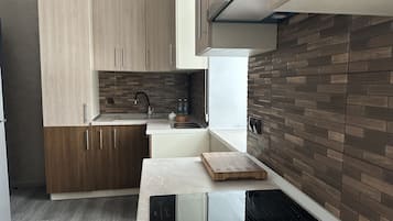 Suite Familiar | Cozinha privada | Uma chaleira elétrica, Rolo de cozinha