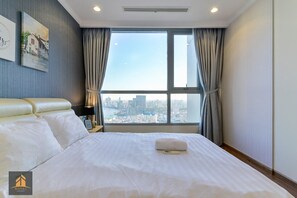 Apartamento de Luxo, 1 quarto, varanda | Edredões de penas, com decoração personalizada 