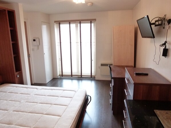 Estúdio | Sala de estar | TV de ecrã plano 