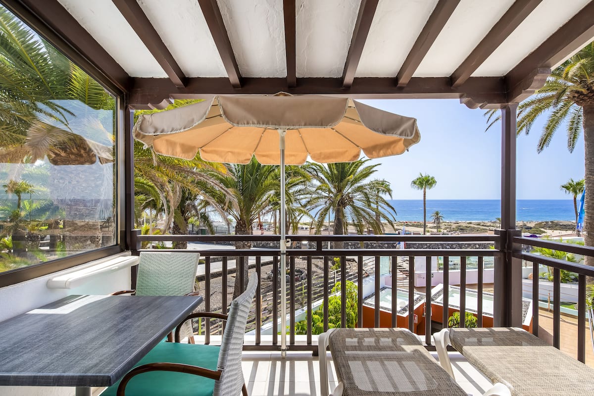 Apartamento, vista parcial para o oceano | Terraço/pátio