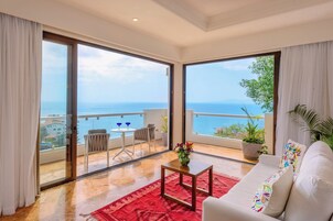 Suíte luxo, 1 cama King, vista para o oceano | 1 quarto, roupas de cama premium