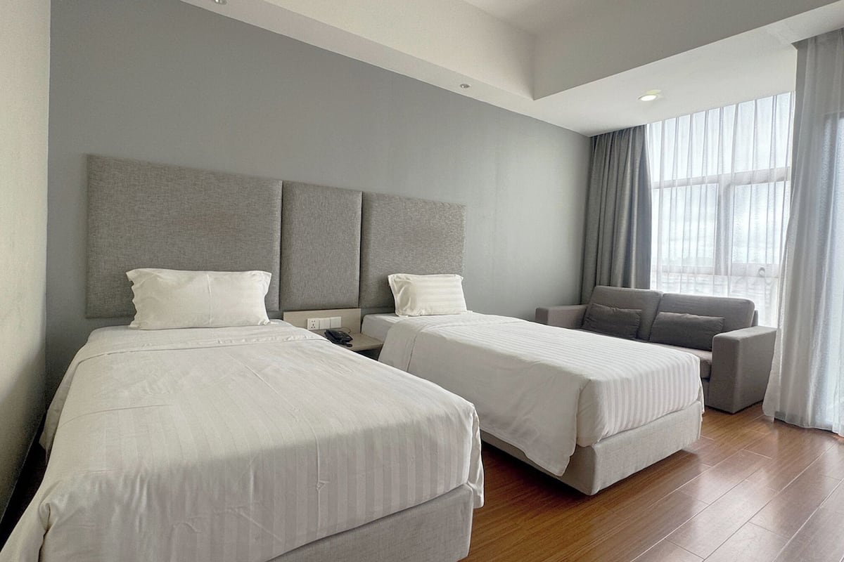 Quarto Twin Deluxe | Cofre no quarto, secretária, ferro/tábua de engomar, Wi-fi grátis