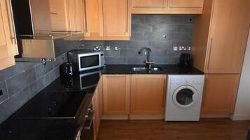 Penthouse Panorâmica, 3 quartos, junto ao pátio | Cozinha privada | Um frigorífico/congelador grande, um micro-ondas, um forno